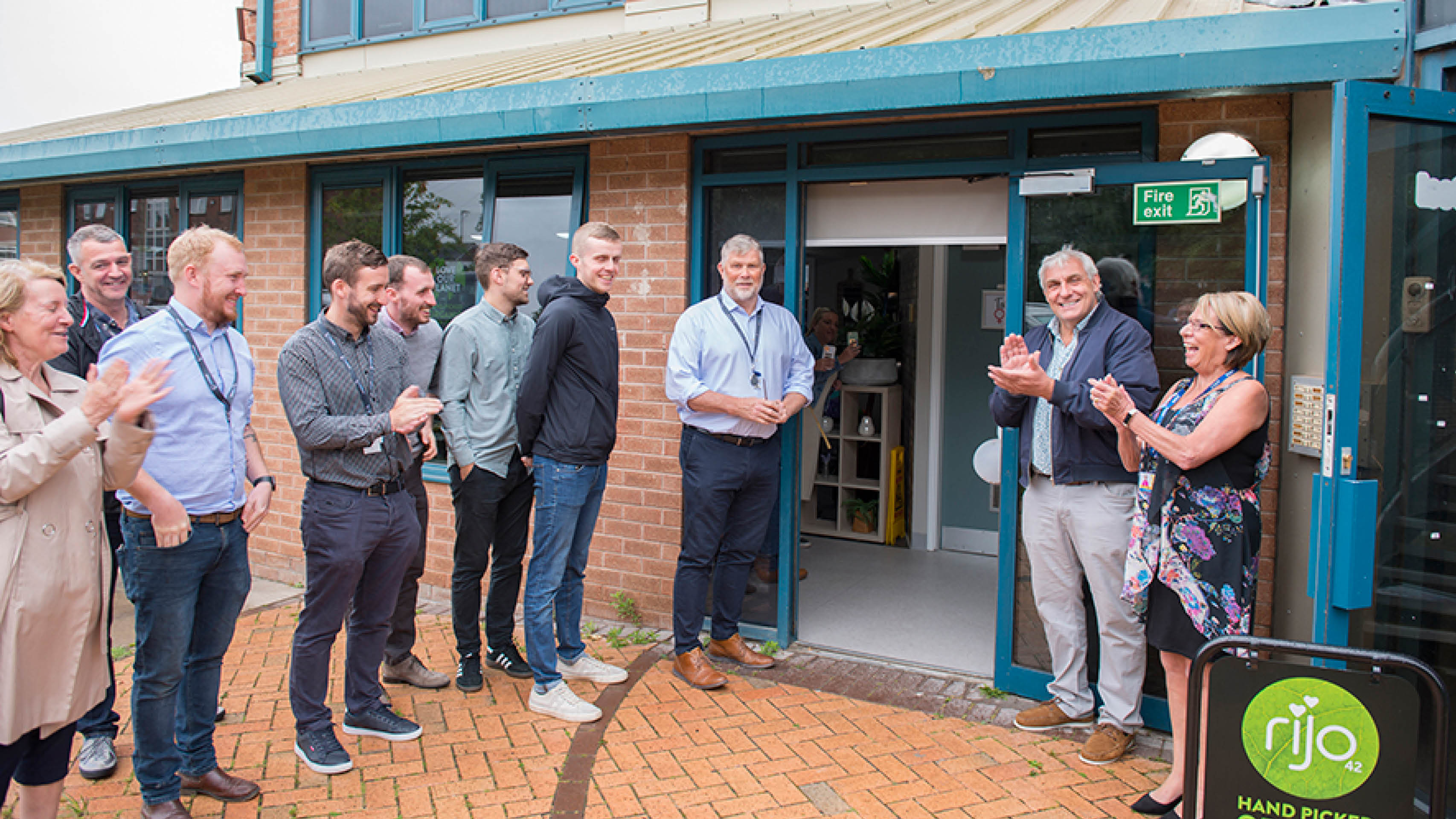 Amspec cuts the ribbon for the grand opening of Embrace's new Community ...