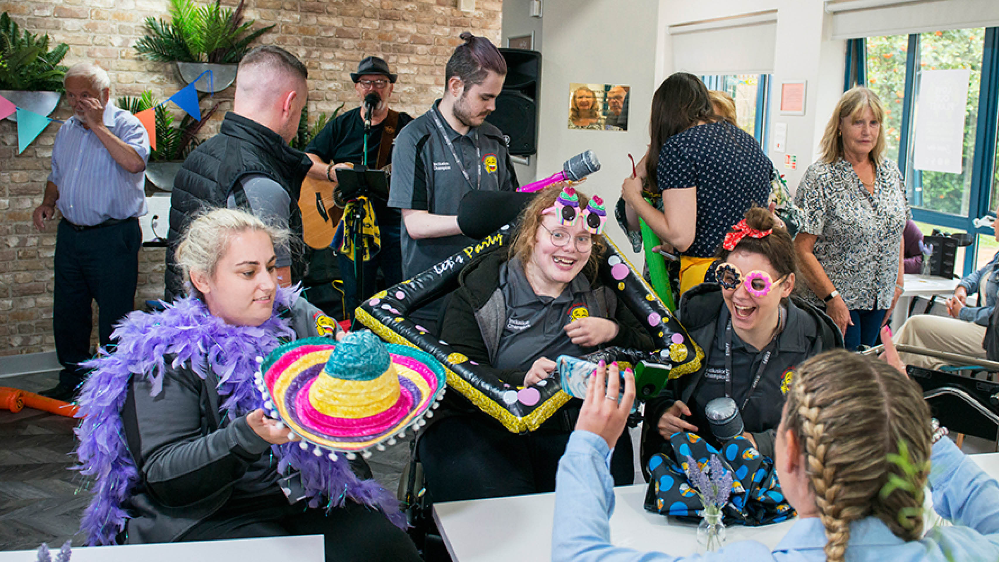 Amspec cuts the ribbon for the grand opening of Embrace's new Community ...