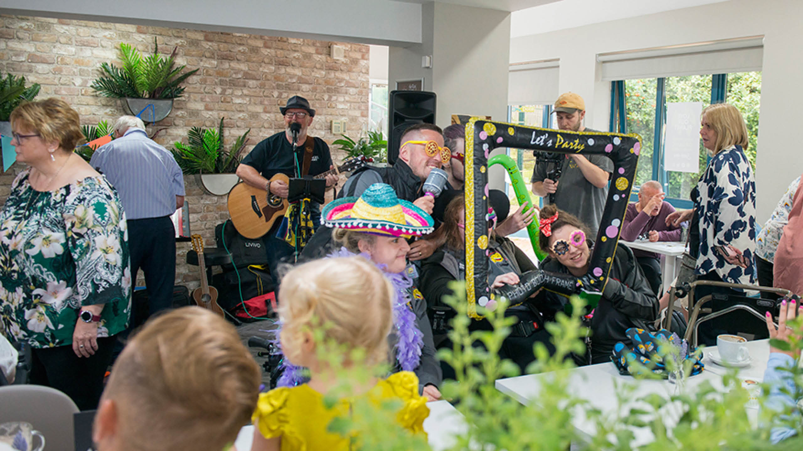 Amspec cuts the ribbon for the grand opening of Embrace's new Community ...